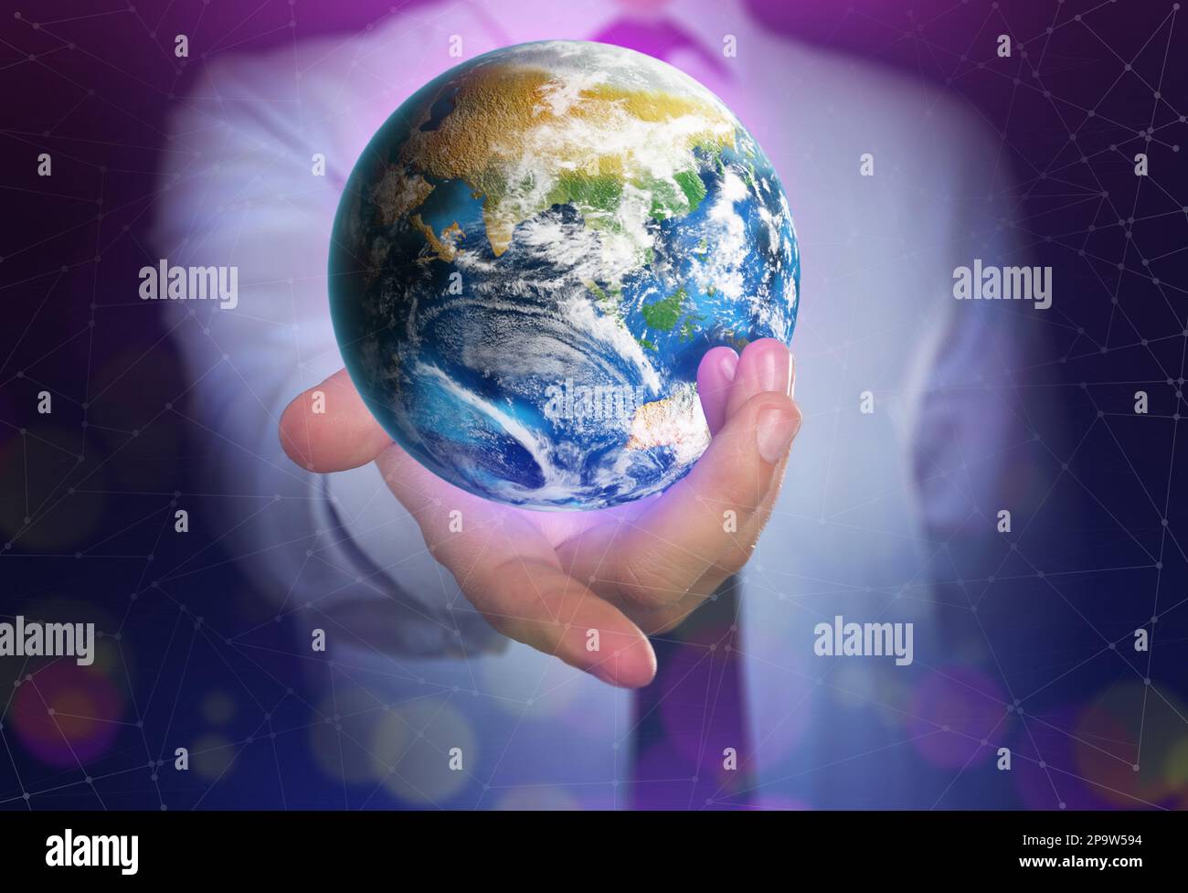 World in our hands. Man holding digital model of Earth, closeup view ...