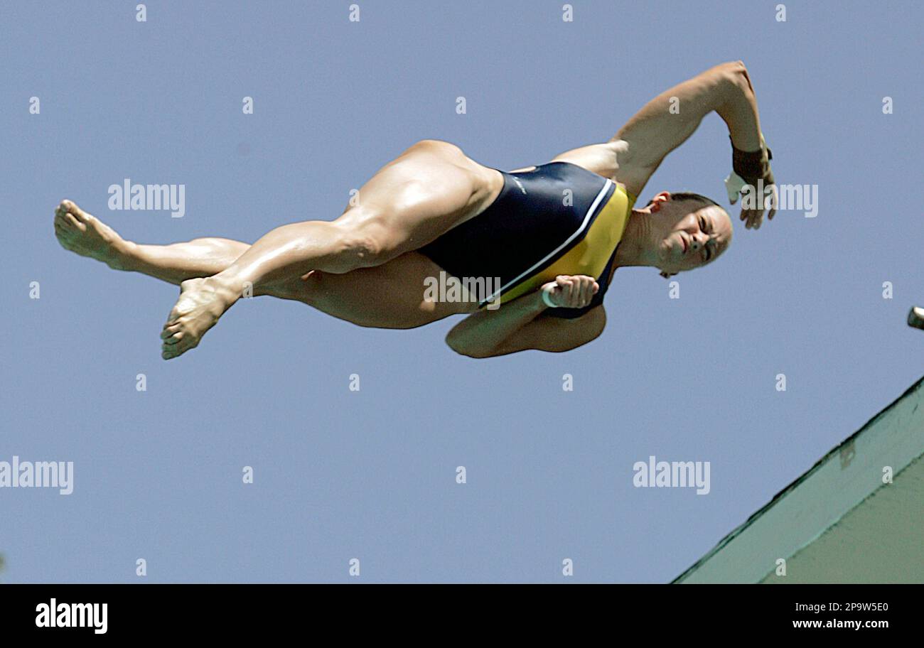 Laura Wilkinson moves through her final dive in the women's 10-meter ...