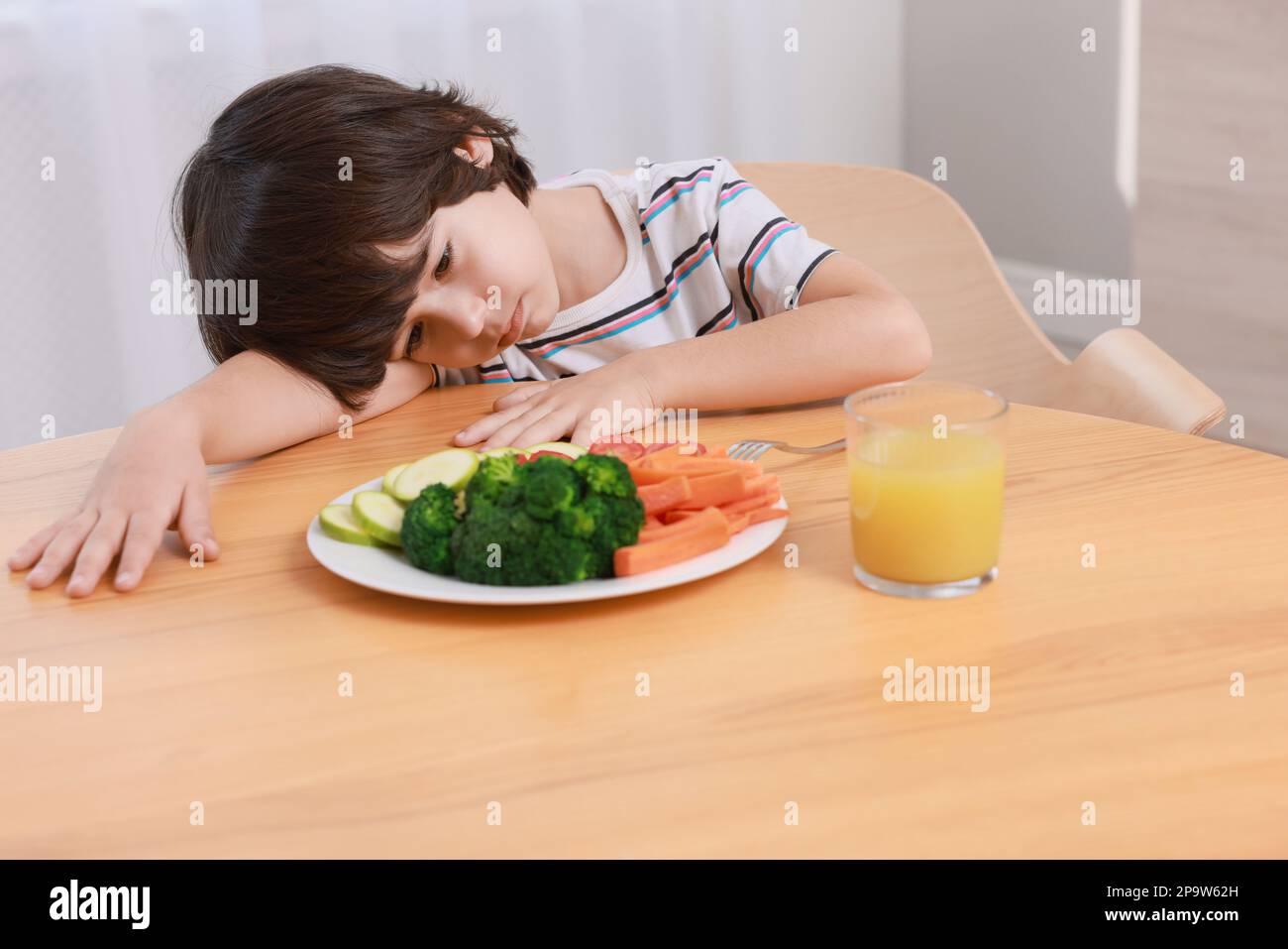 Kid sad vegetables hi-res stock photography and images - Alamy