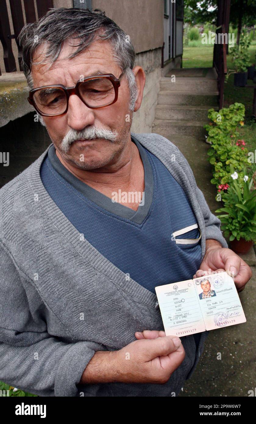 Dragan Dabic, a 66-year old peasant and construction worker, poses ...
