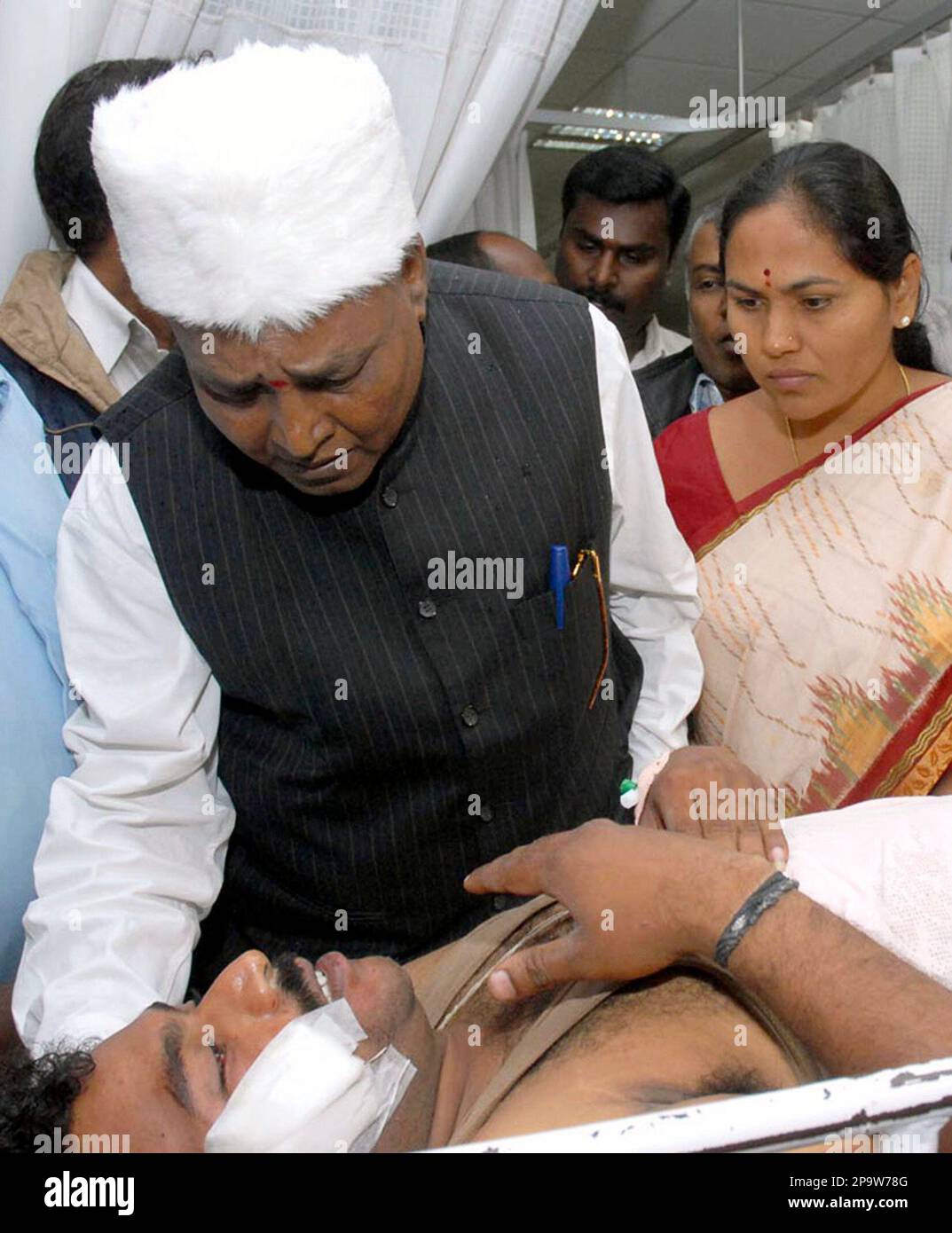 Karnataka state Excise Minister Katta Subramanya Naidu, left, and Rural ...