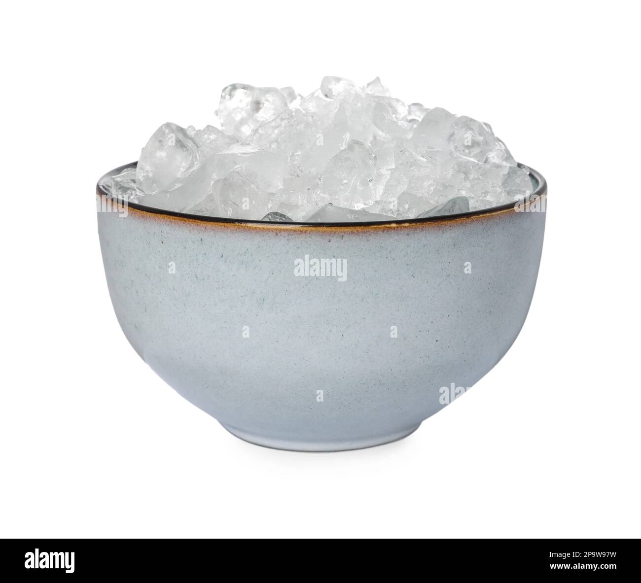 Crushed ice in bowl on white background Stock Photo - Alamy