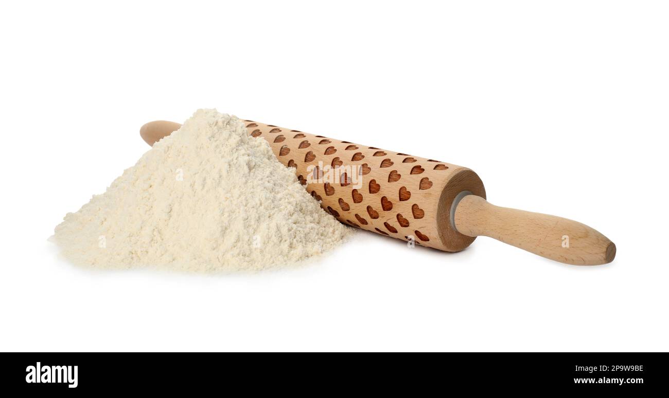 Wooden rolling pin and flour on white background Stock Photo - Alamy