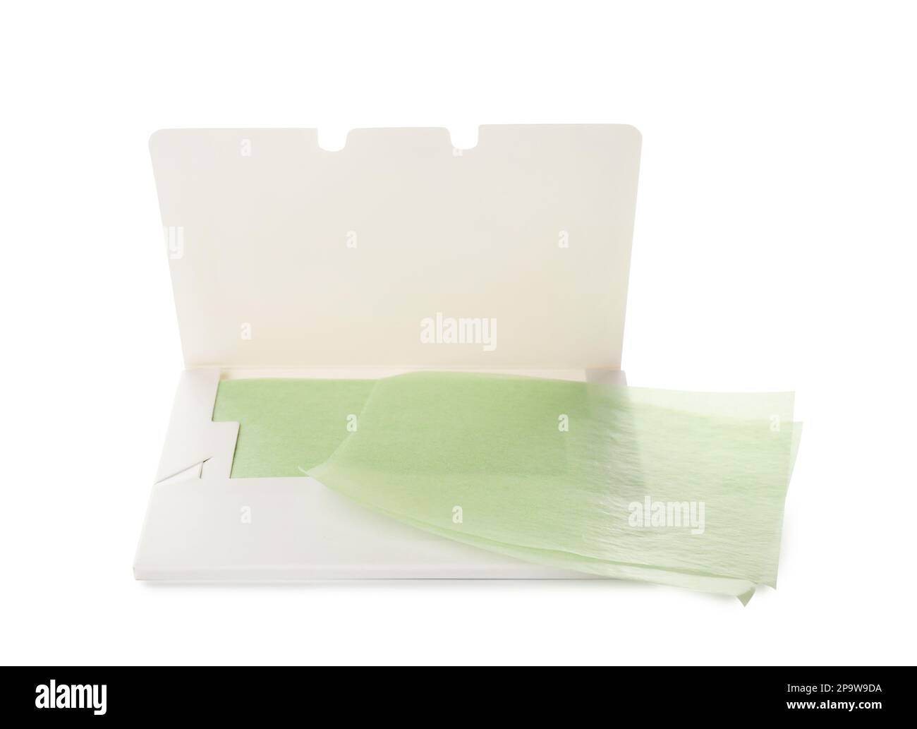 Package with facial oil blotting tissues on white background ...