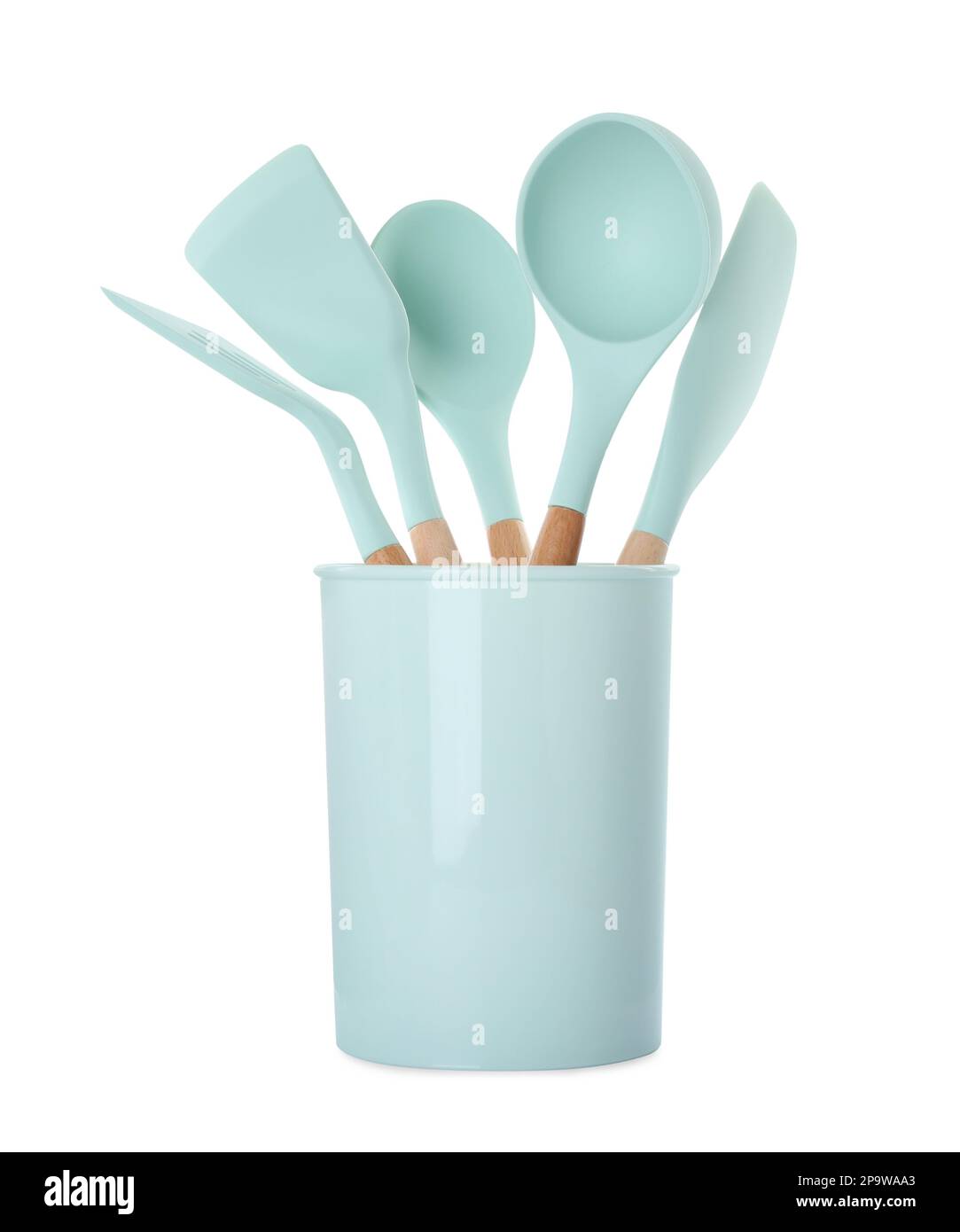 Set of turquoise kitchen utensils in holder isolated on white Stock ...