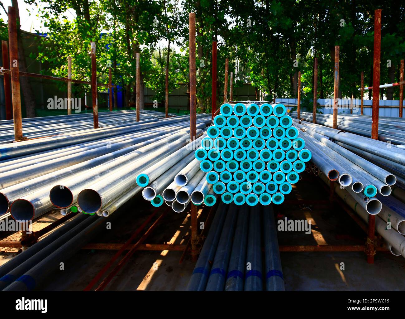 Stacked in the steel tube Stock Photo - Alamy