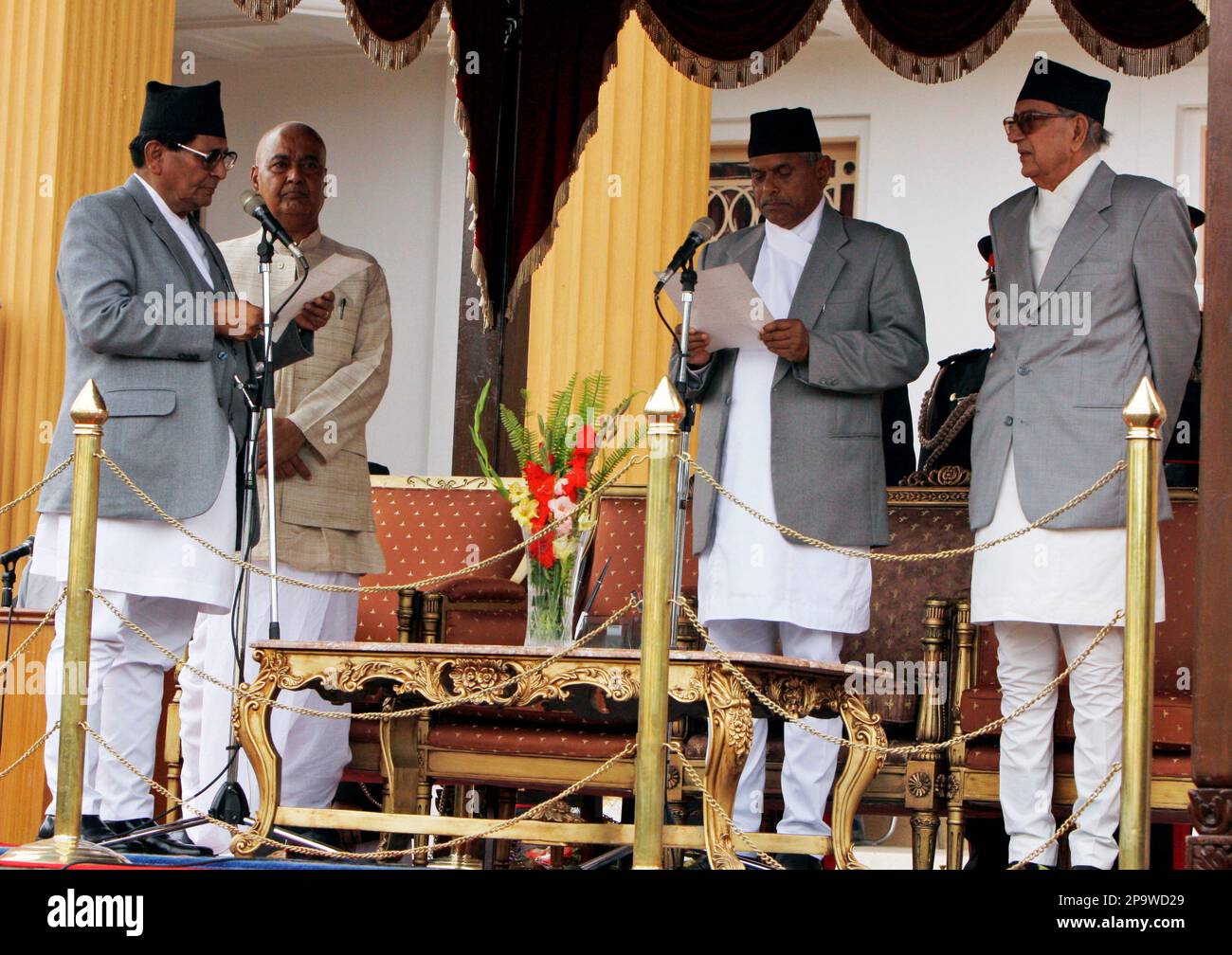 Nepal's first president Ram Baran Yadav, second right, is sworn into ...
