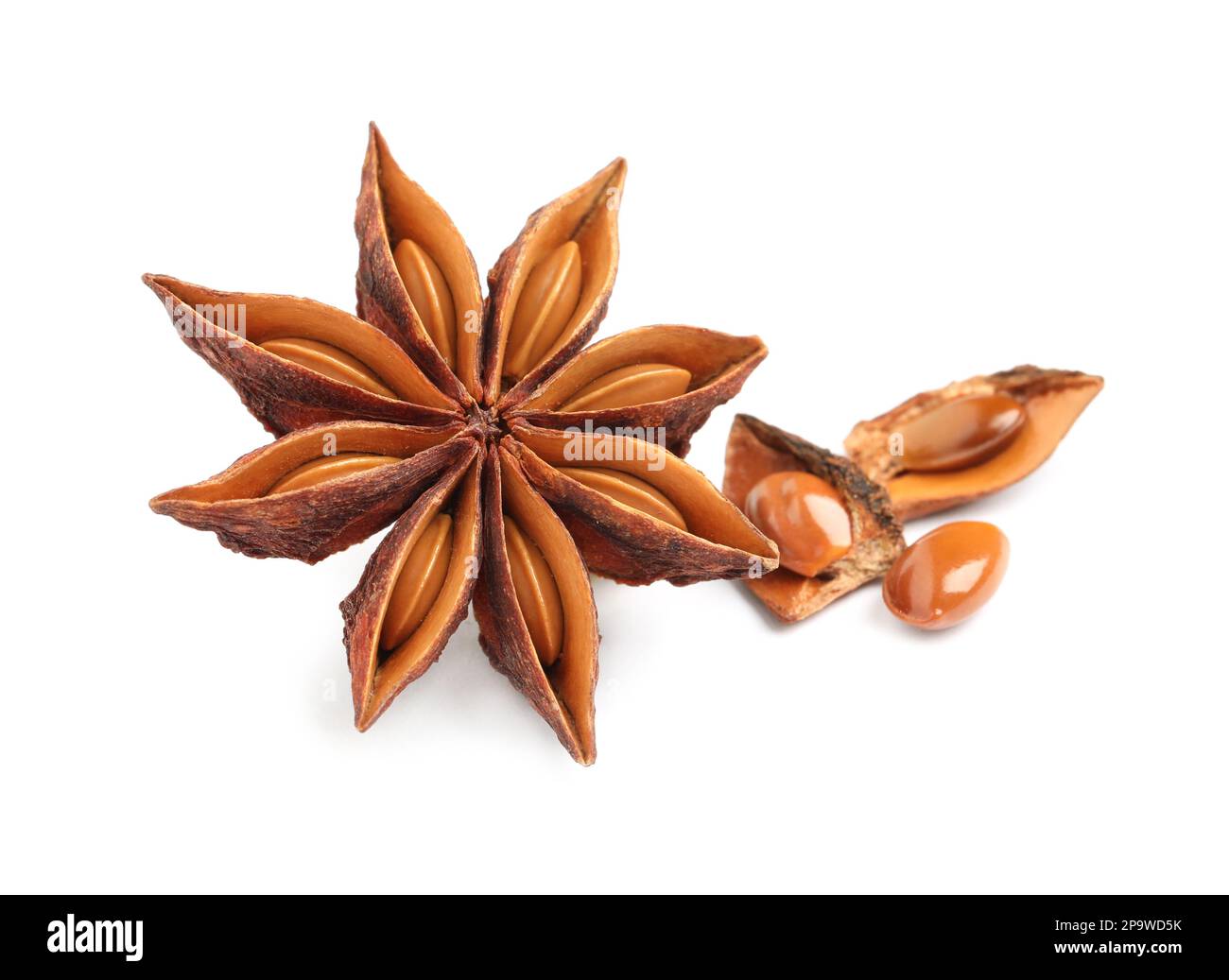 Dry anise star with seeds on white background Stock Photo - Alamy