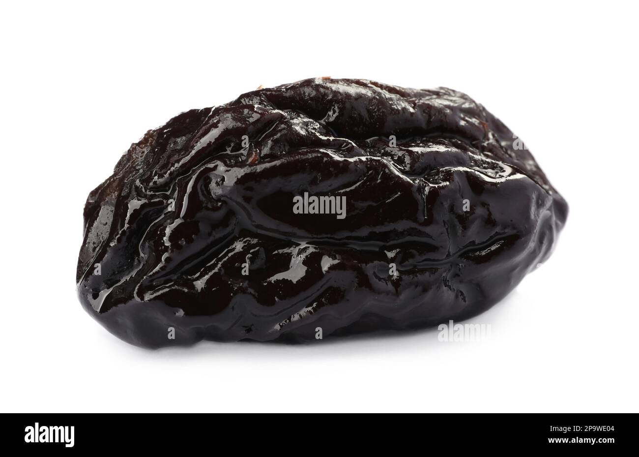 One sweet dried prune isolated on white Stock Photo - Alamy