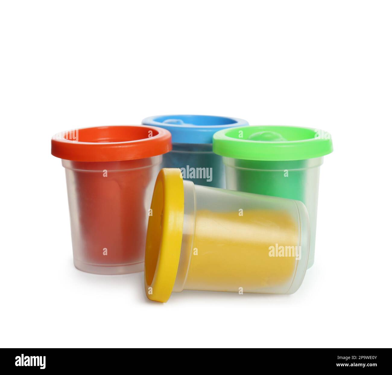 Plastic containers with colorful play dough on white background Stock Photo - Alamy