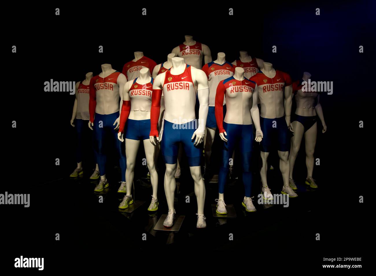 Olympic uniform for the Russian Olympic team are on display at a ...