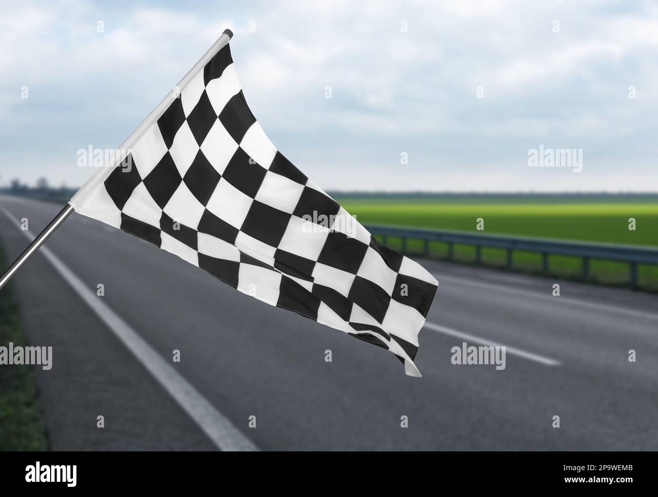 Racing checkered flag crossed hi-res stock photography and images - Alamy