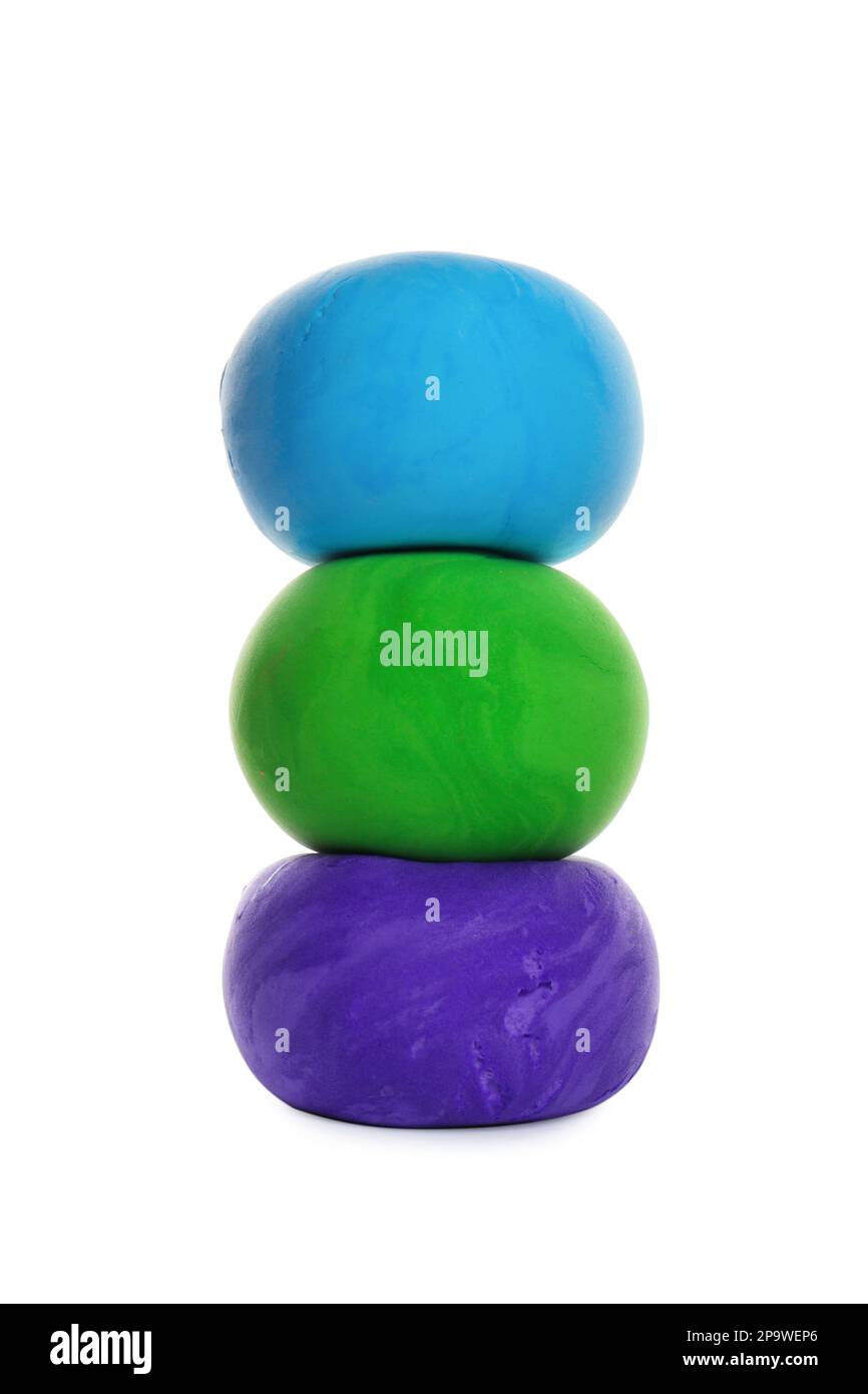 Stack of color play dough balls isolated on white Stock Photo - Alamy
