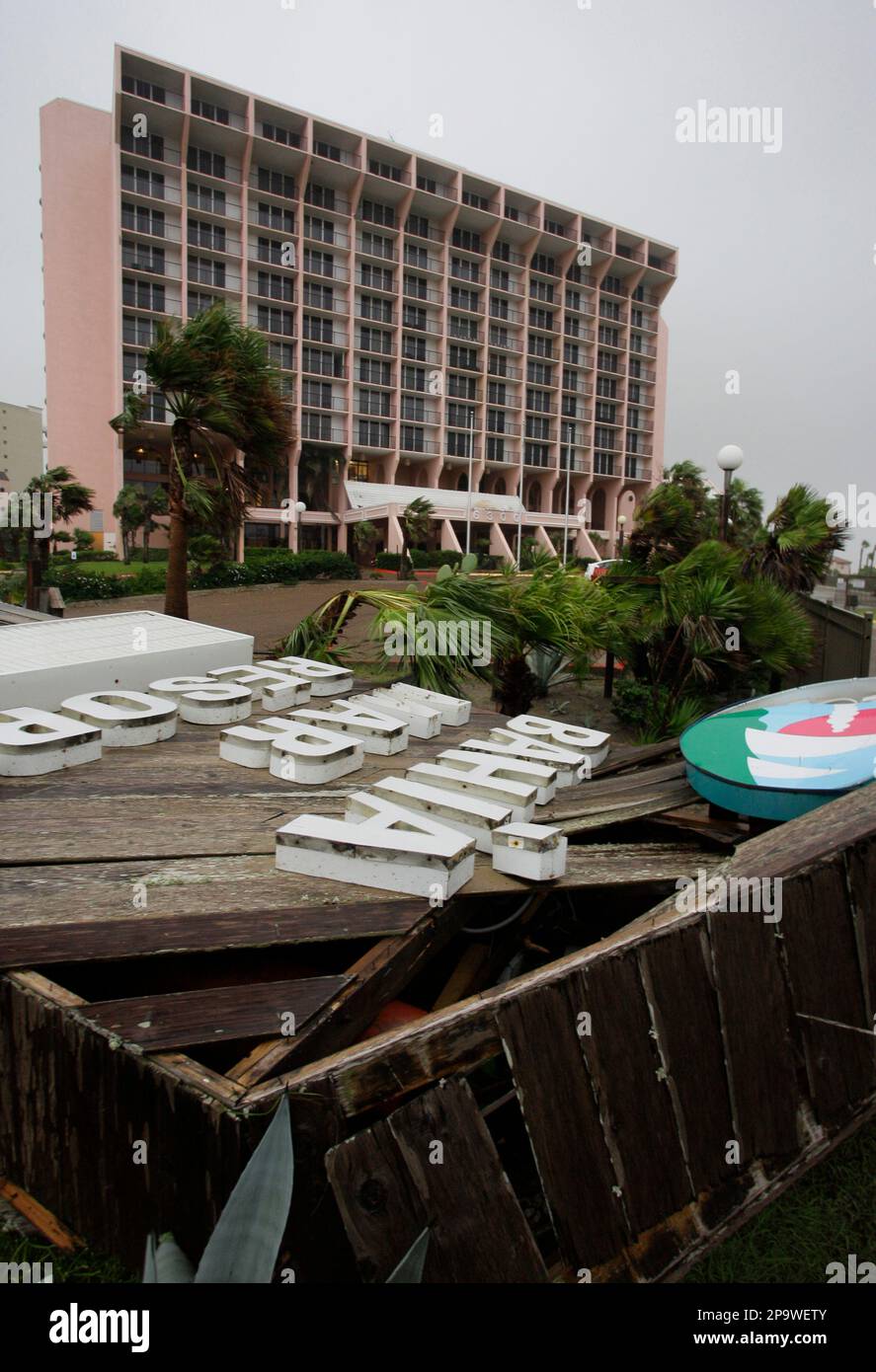 The sign outside Bahia Mar Resort sits on the ground after being blown ...