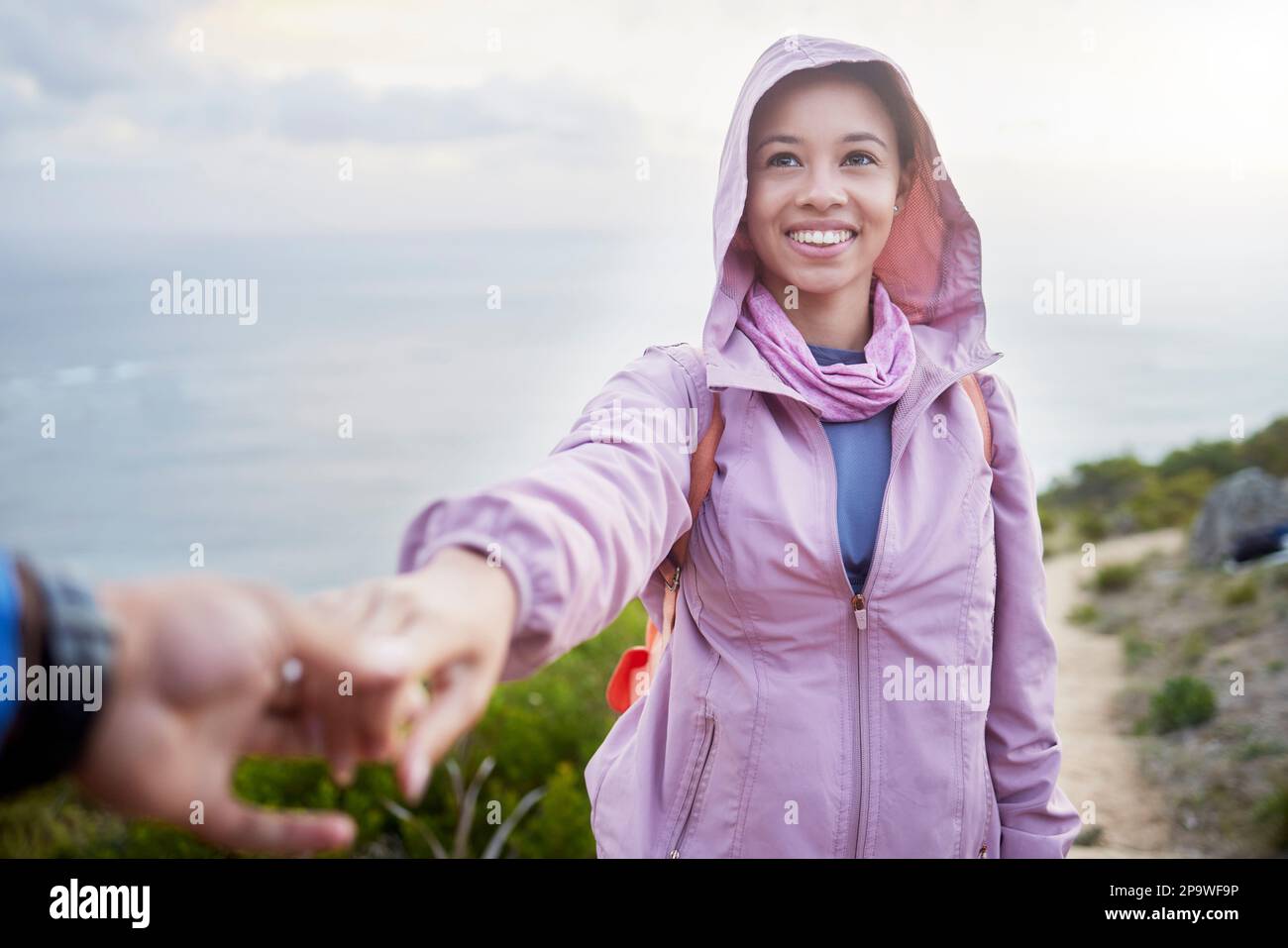 Couple holding hands, pov and hiking with smile, walking and adventure ...