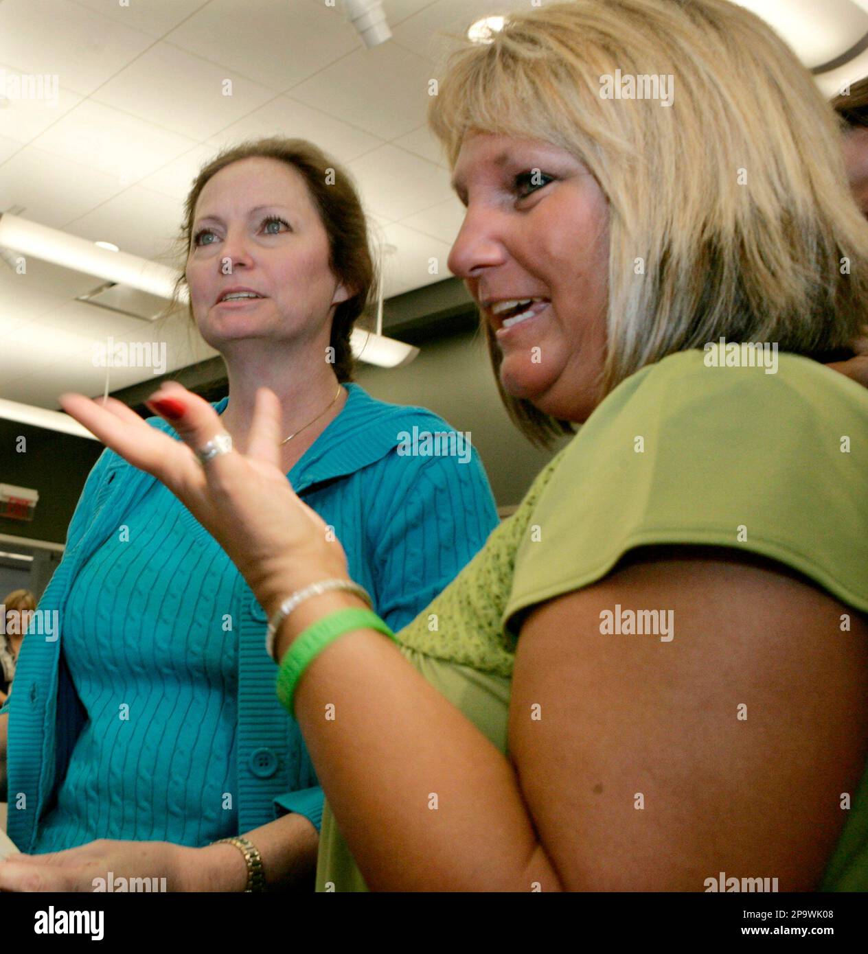Mary Ann Lunde, left, the mother of Trine Engebretsen, who received a ...