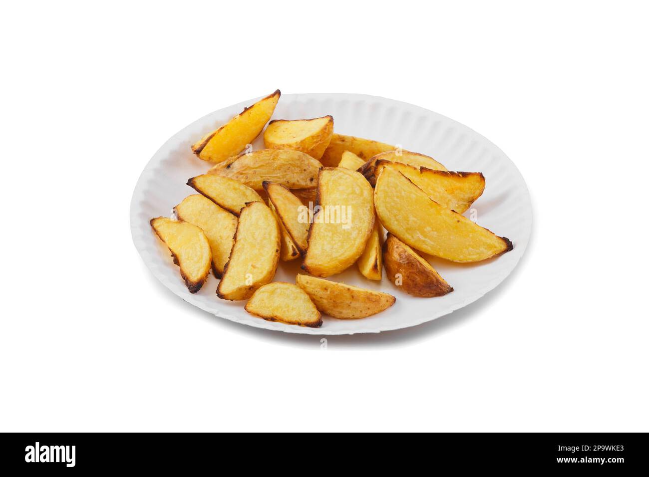 Delicious fried potato wedges on paper dish, isolated on white ...