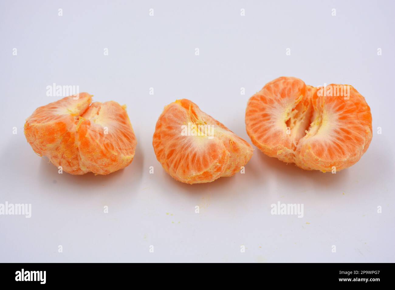 Ripe and delicious fresh fruit, peeled orange tangerine without skin ...