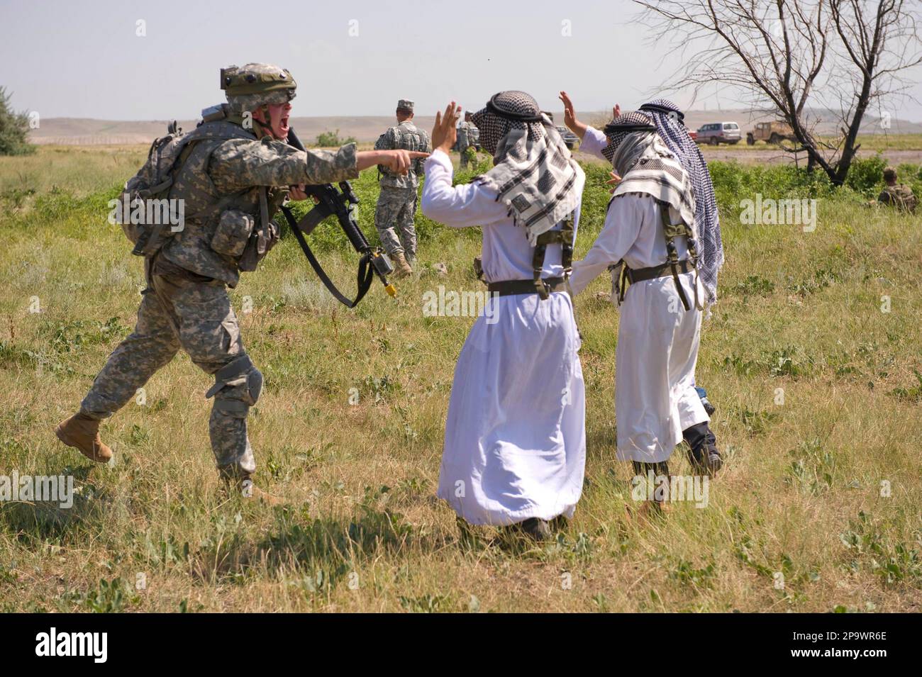 U.S. and Georgian soldiers participate in a situational tactical ...