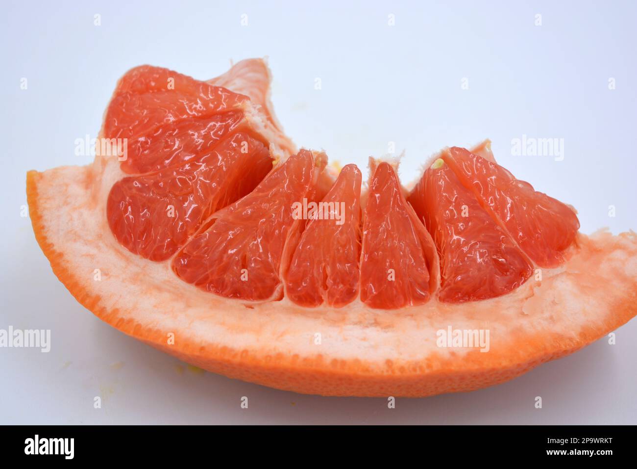 Fresh fruit, delicious and healthy yellow red ripe grapefruit lies cut ...