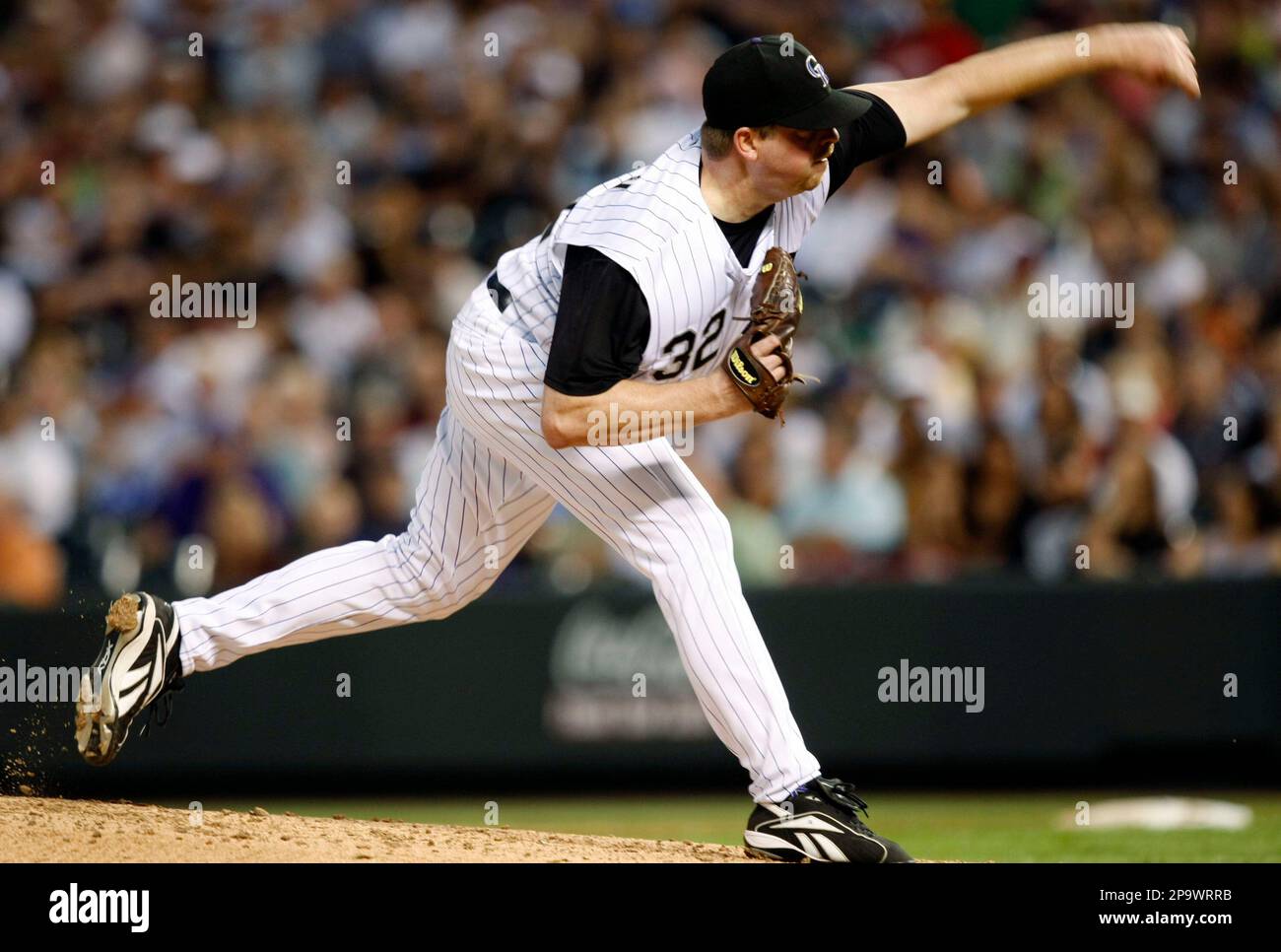 Colorado Rockies starting pitcher Glendon Rusch delivers a pitch to ...