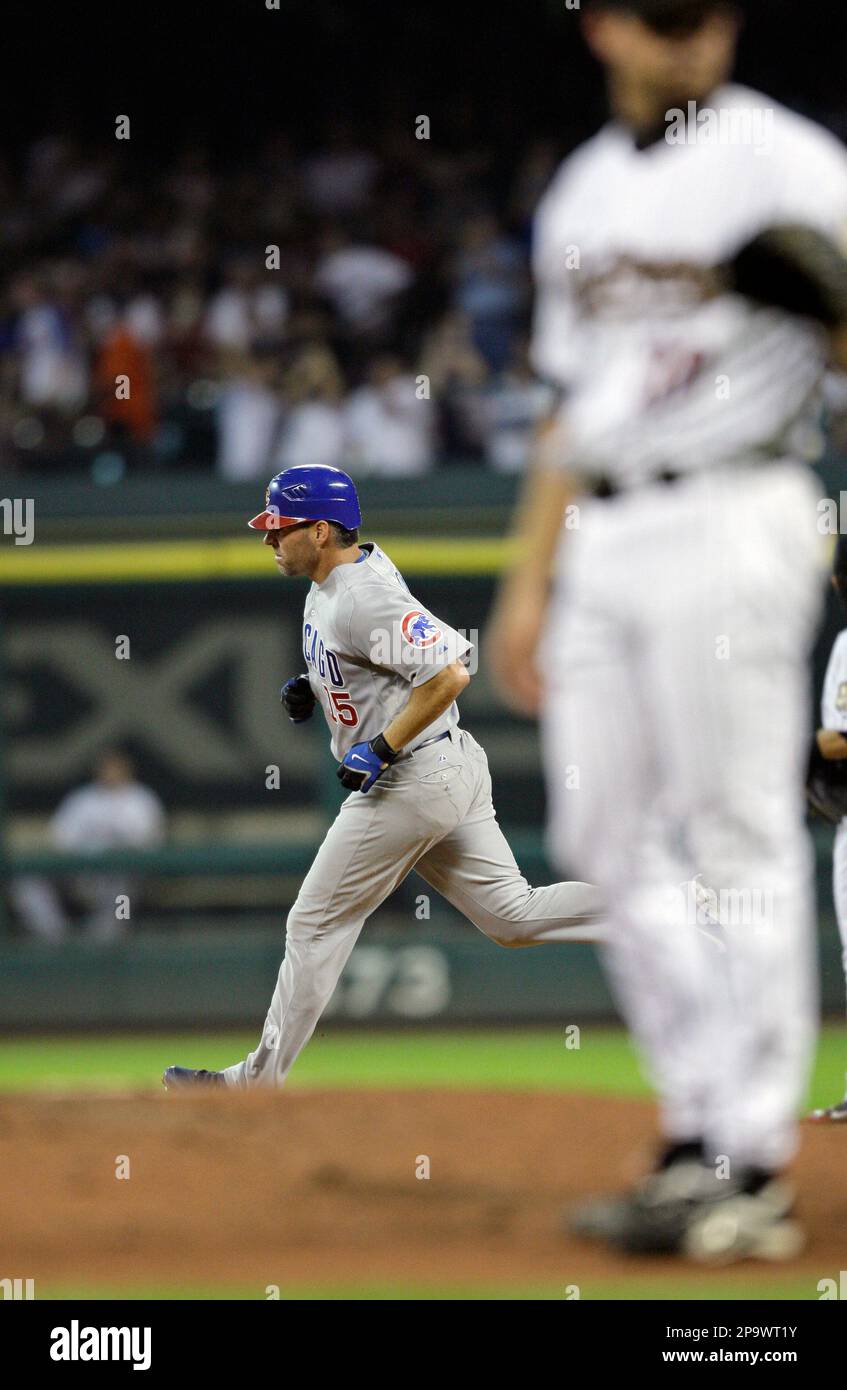 Chicago Cubs' Jim Edmonds (15) runs the bases after hitting a home run ...