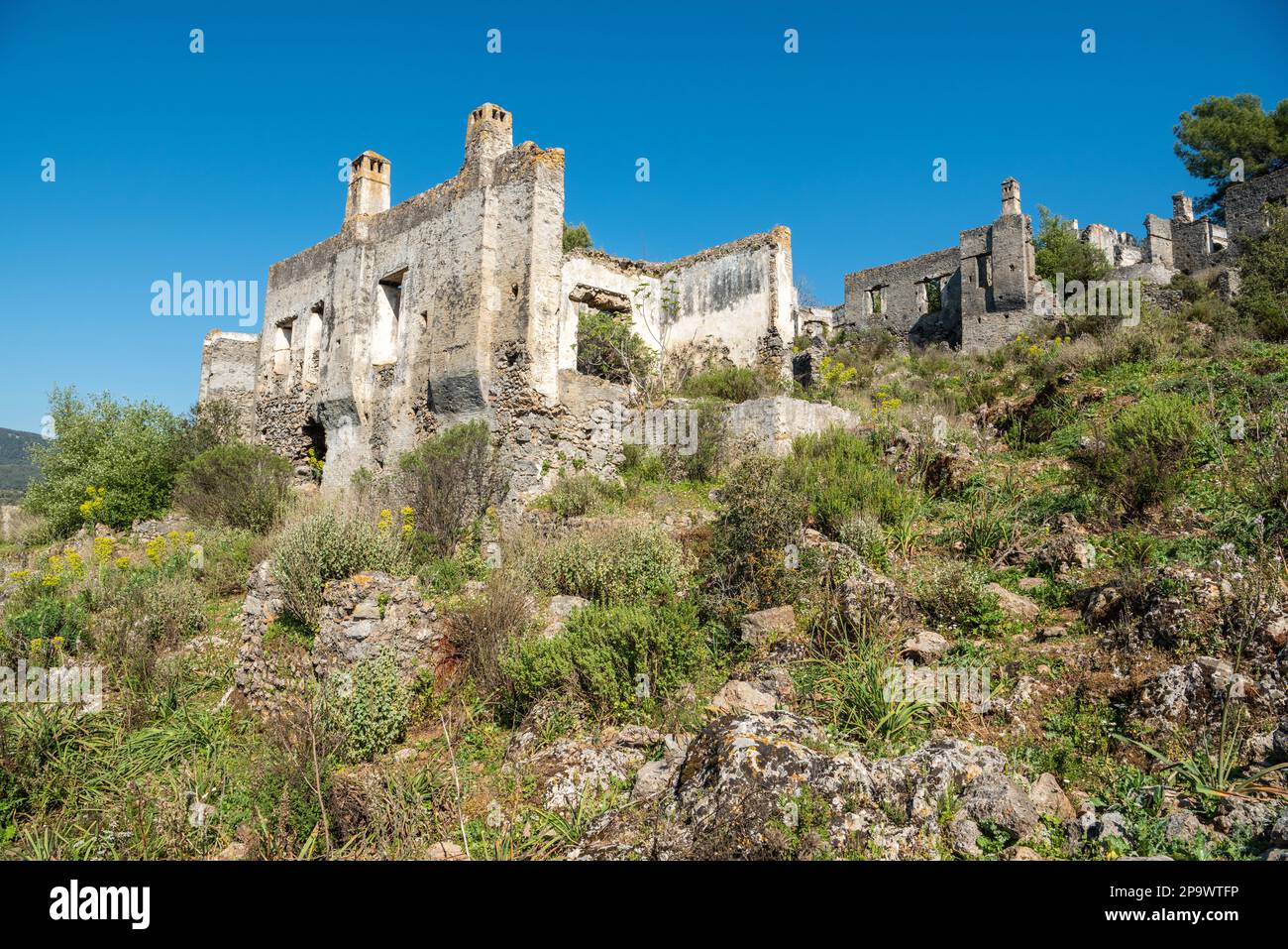Ruined houses of Kayakoy (Levissi) abandoned village near Fethiye in ...