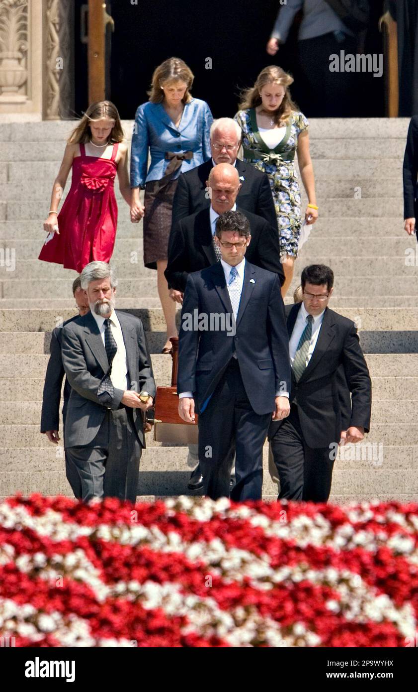 The casket of former White House Press Secretary Tony Snow is carried ...
