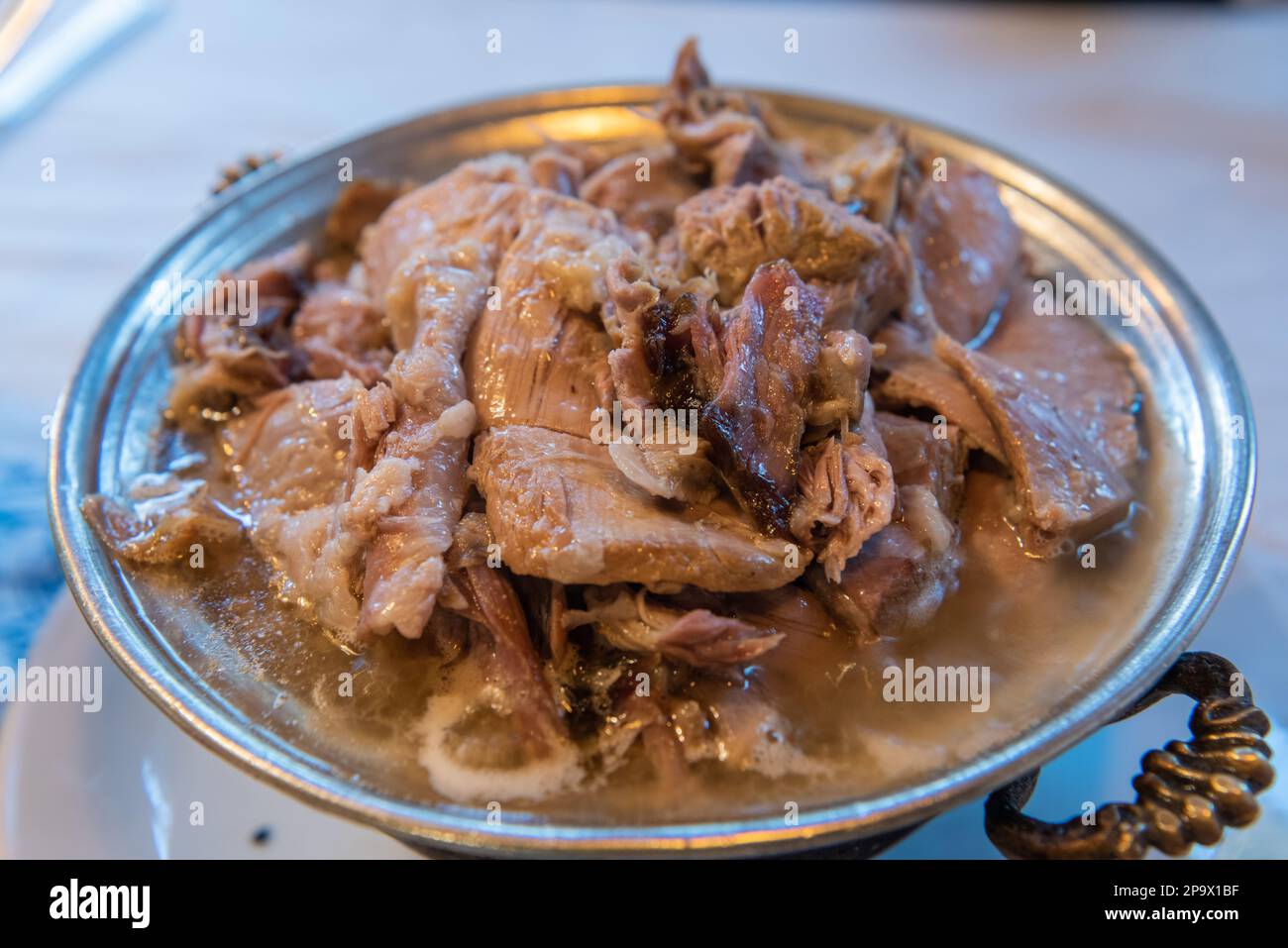 Plate of lamb meat slowly cooked in tandir clay oven in Turkey Stock ...
