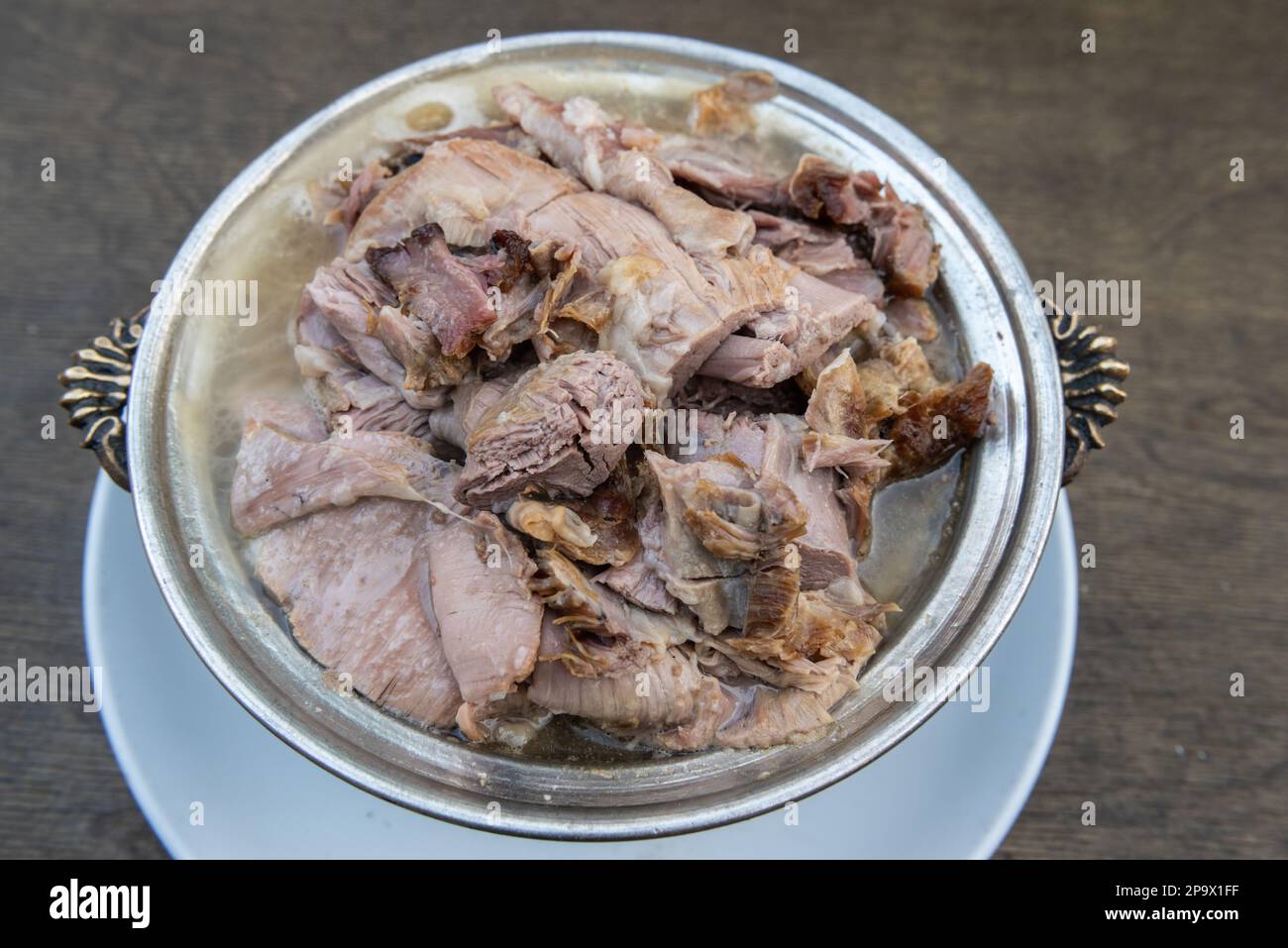 Plate of lamb meat slowly cooked in tandir clay oven in Turkey Stock ...