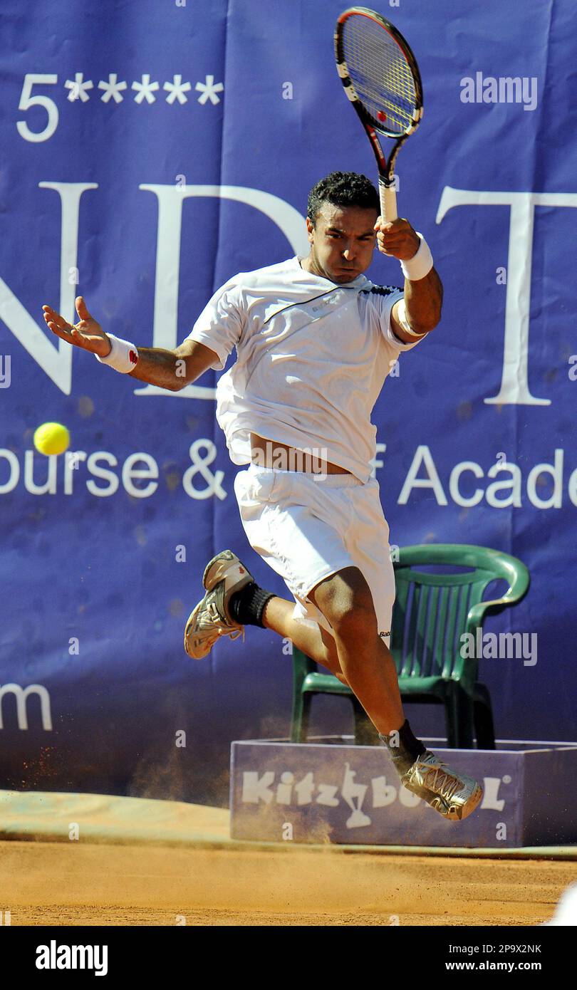 Brian Dabul from Argentina returns a ball during his match against ...