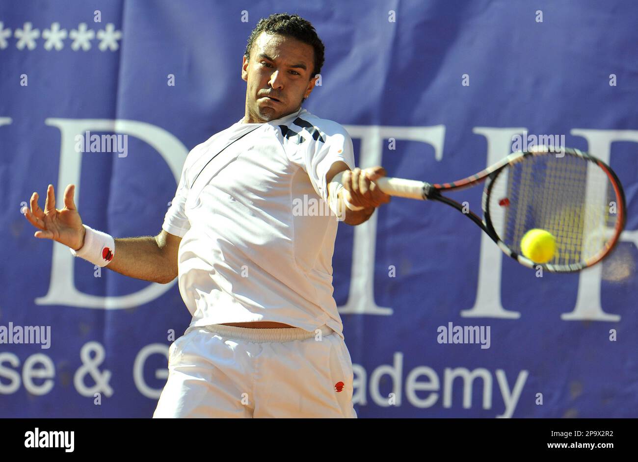 Brian Dabul from Argentina returns a ball during his match against ...