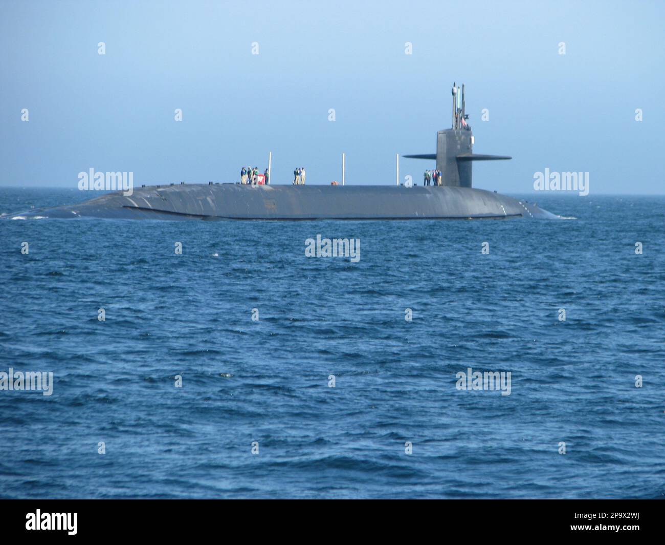 The 560-foot nuclear submarine USS Nebraska surfaces last week near ...