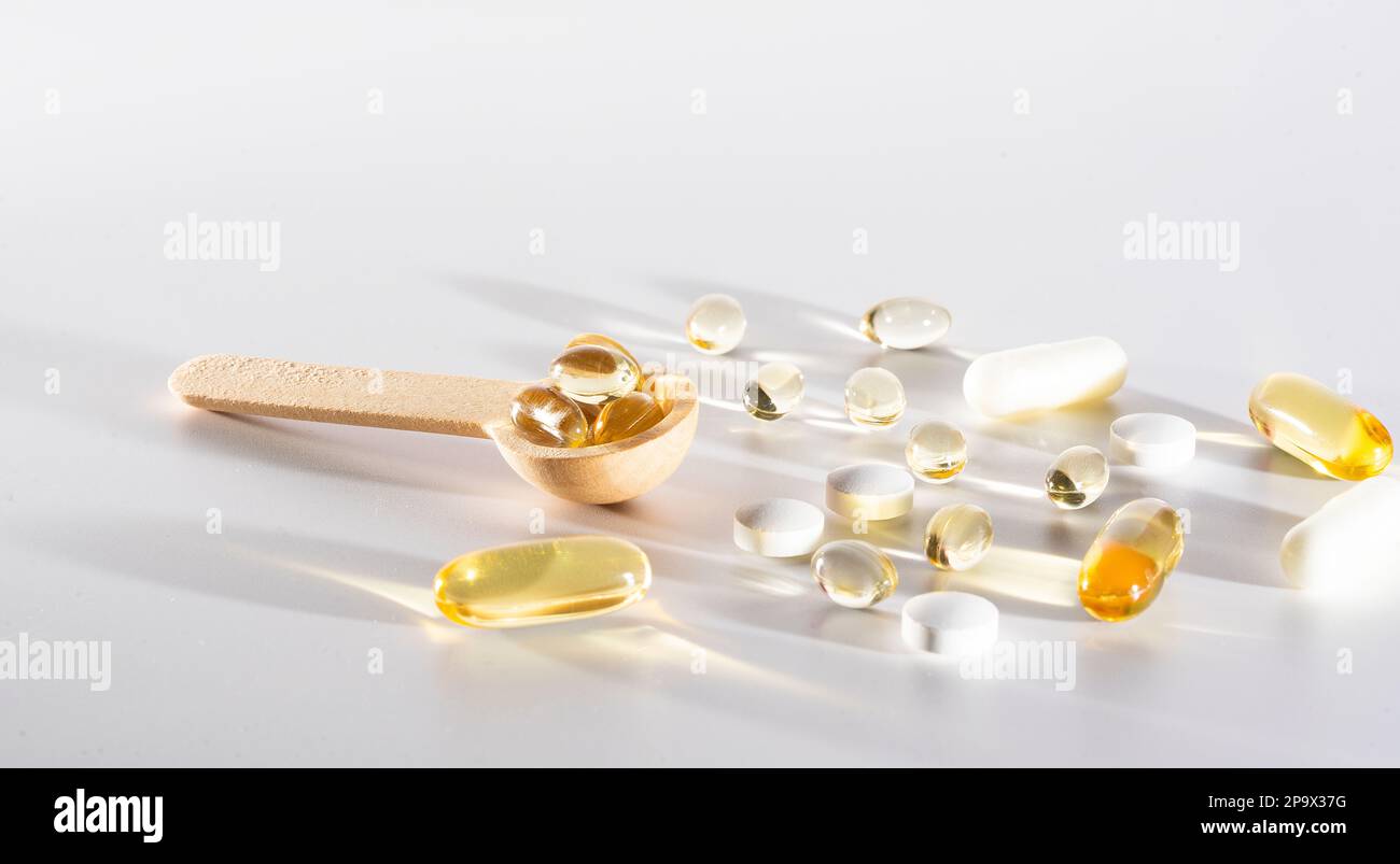 Spoons with vitamins, Vitamin D, omega 3, omega 6, Food supplement oil ...