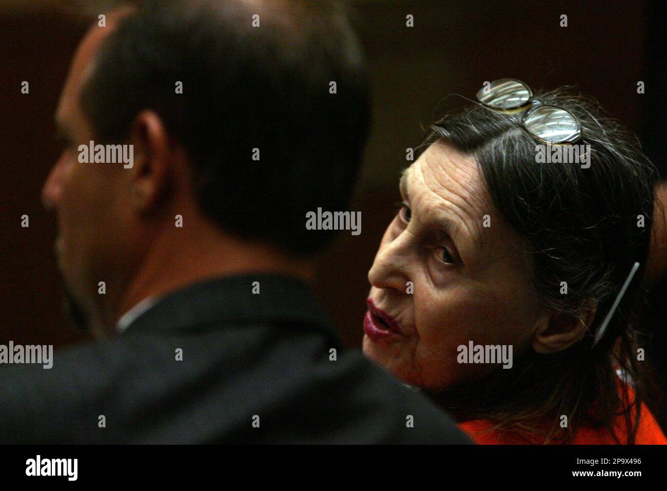Olga Rutterschmidt, 75, right, talks with her attorney Michael Sklar ...