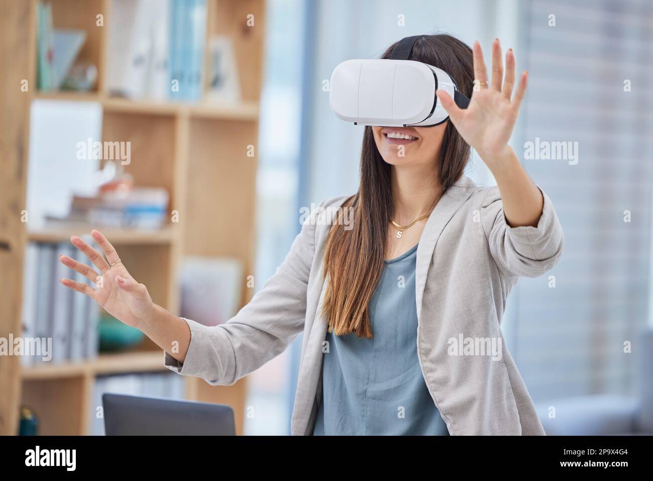 Vr, virtual reality and business woman in office exploring metaverse ...