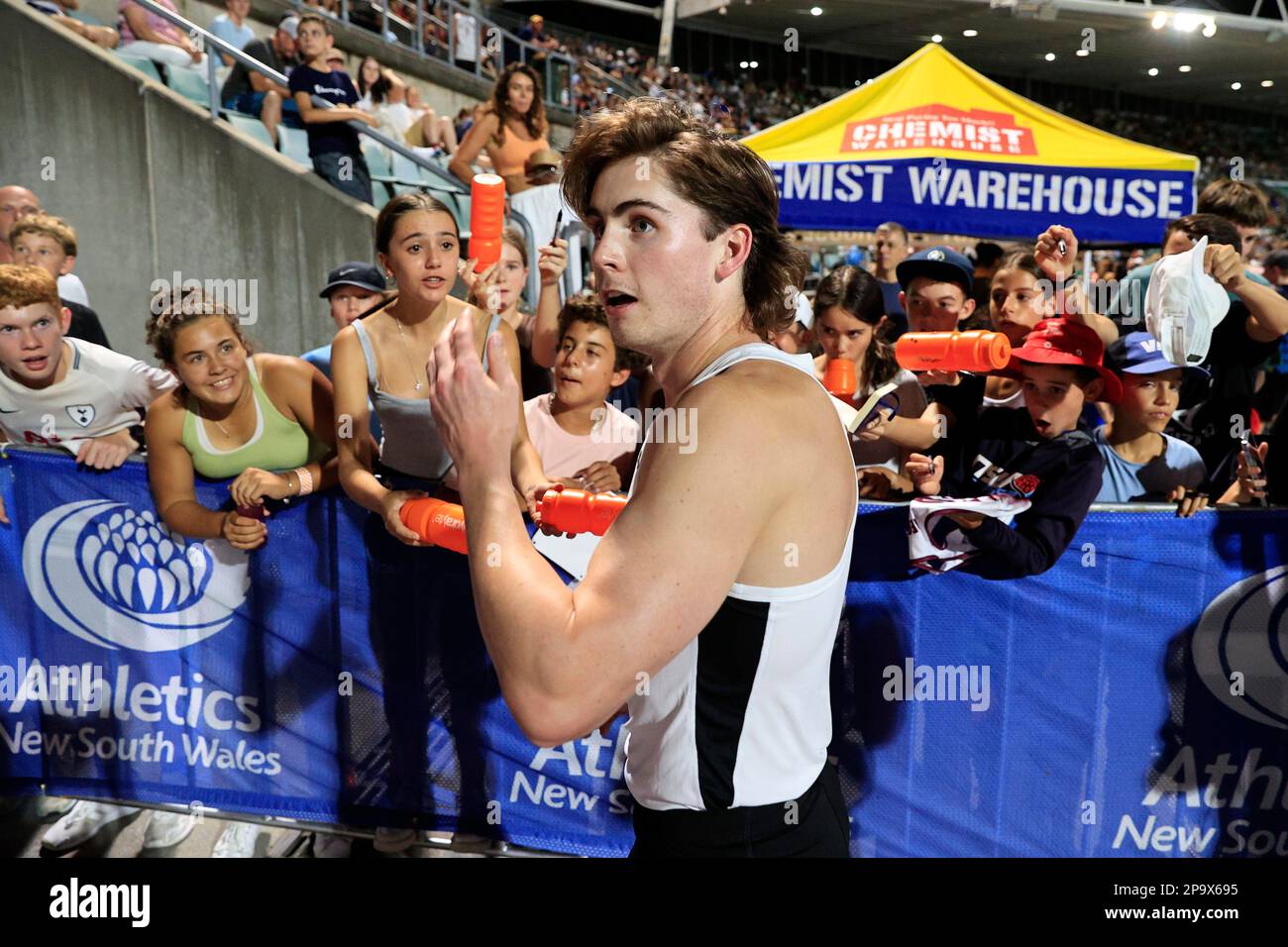Rohan Browning signs autographs after winning the Men 4x100 Metres ...