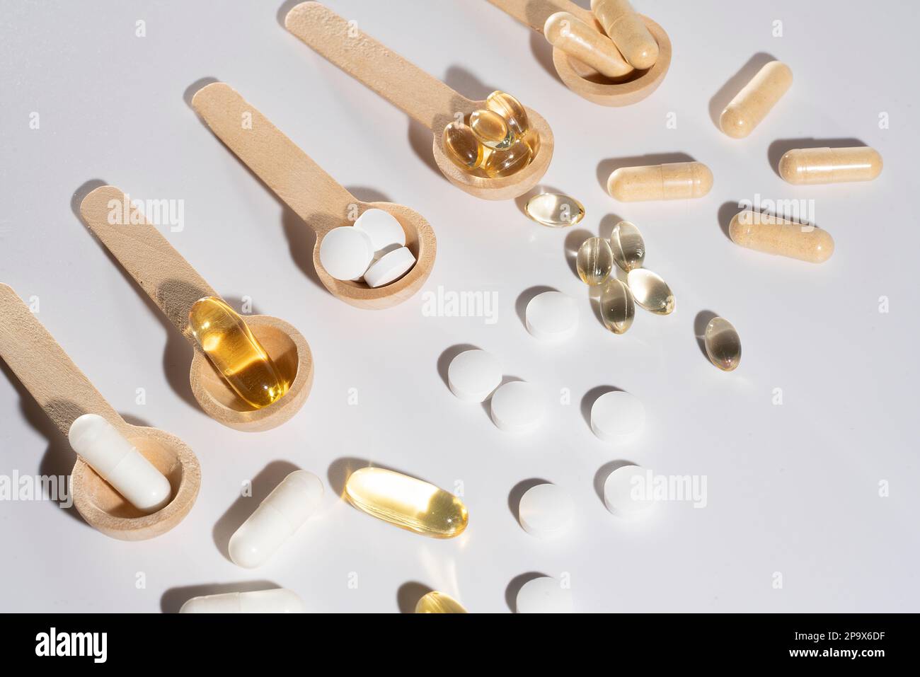 Spoons with vitamins, Vitamin D, omega 3, omega 6, Food supplement oil ...