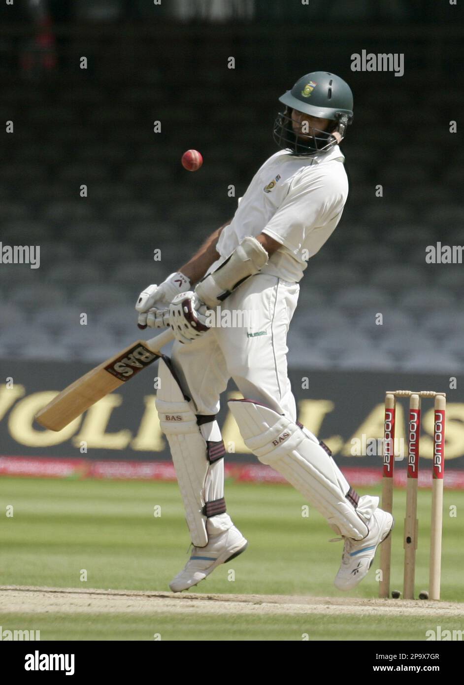 South Africa's Hashim Amla is hit by a ball from England's James ...
