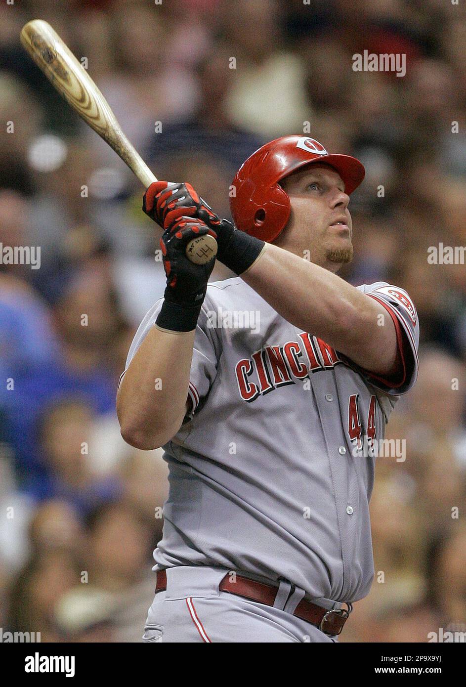 Cincinnati Reds' Adam Dunn watches his home run during the ninth inning ...