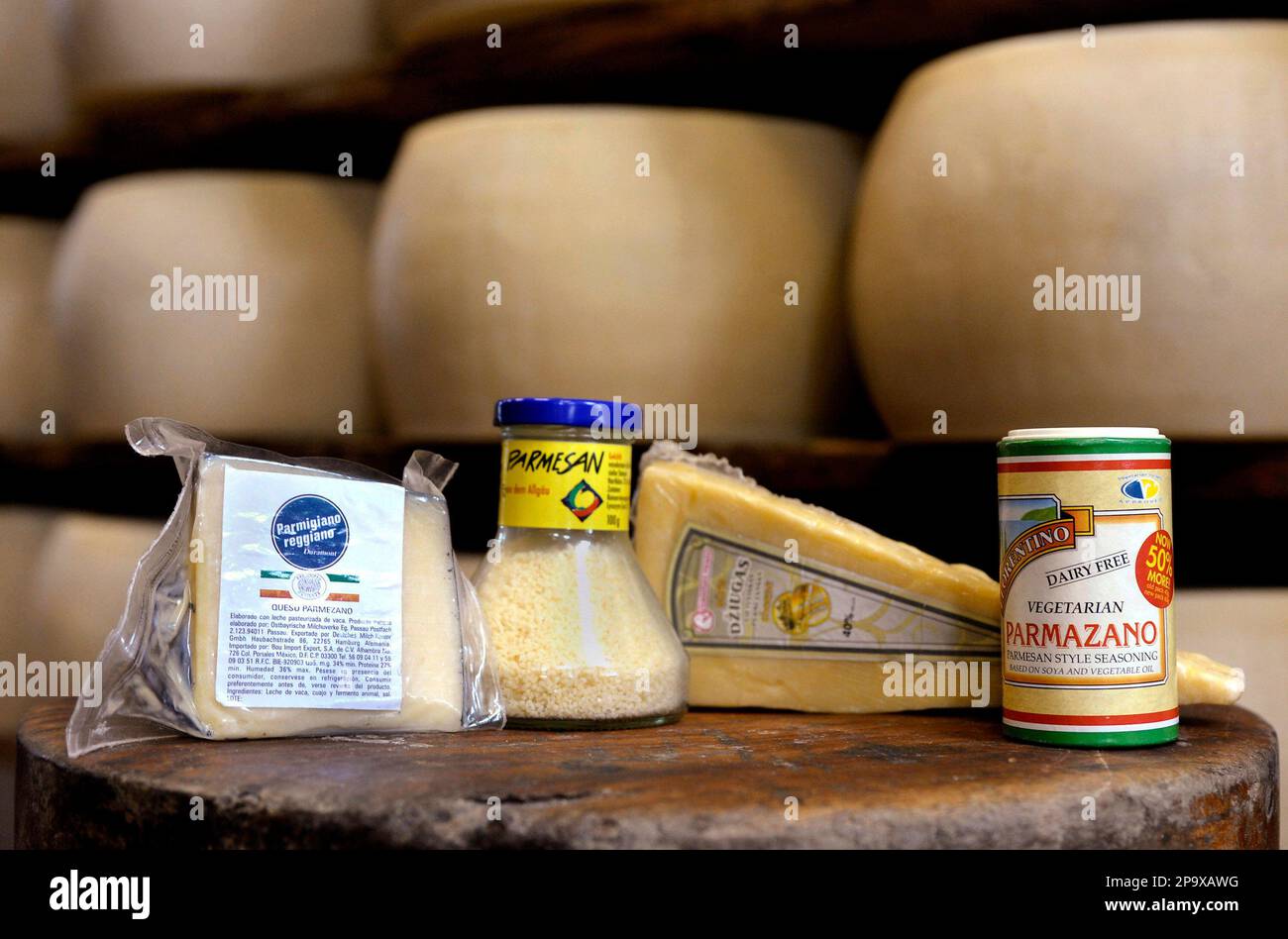 Fake Parmigiano-Reggiano cheese products are seen in front of original ...