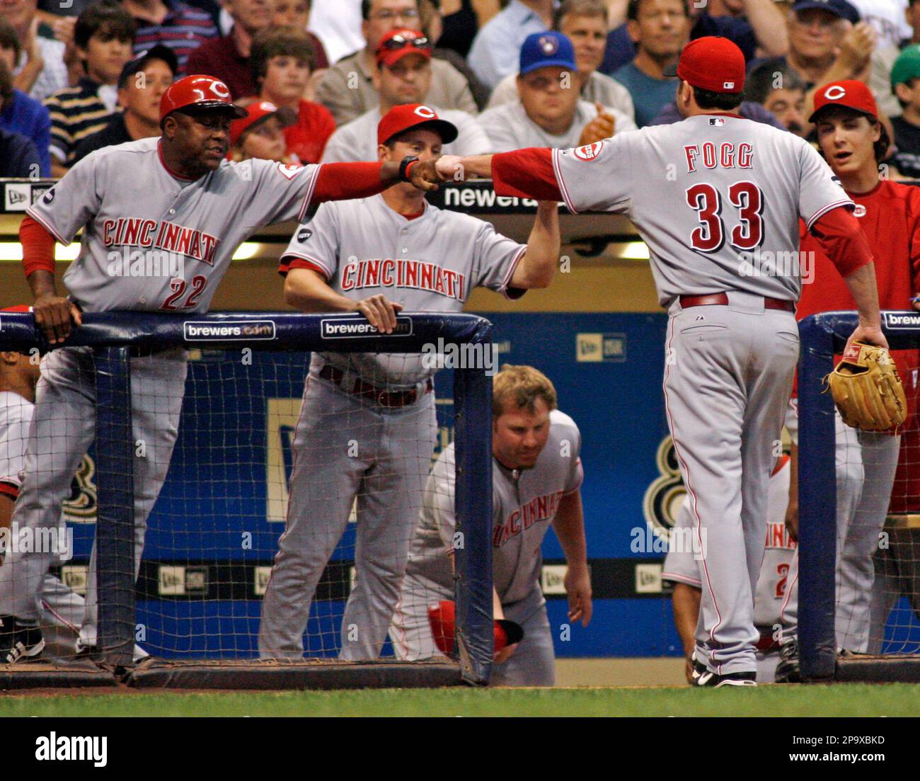 Cincinnati Reds starting pitcher Josh Fogg, right, walks off the field ...
