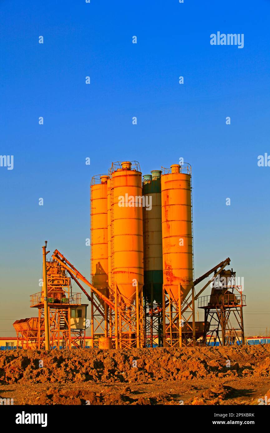 Concrete mixing silo, site construction facilities Stock Photo - Alamy