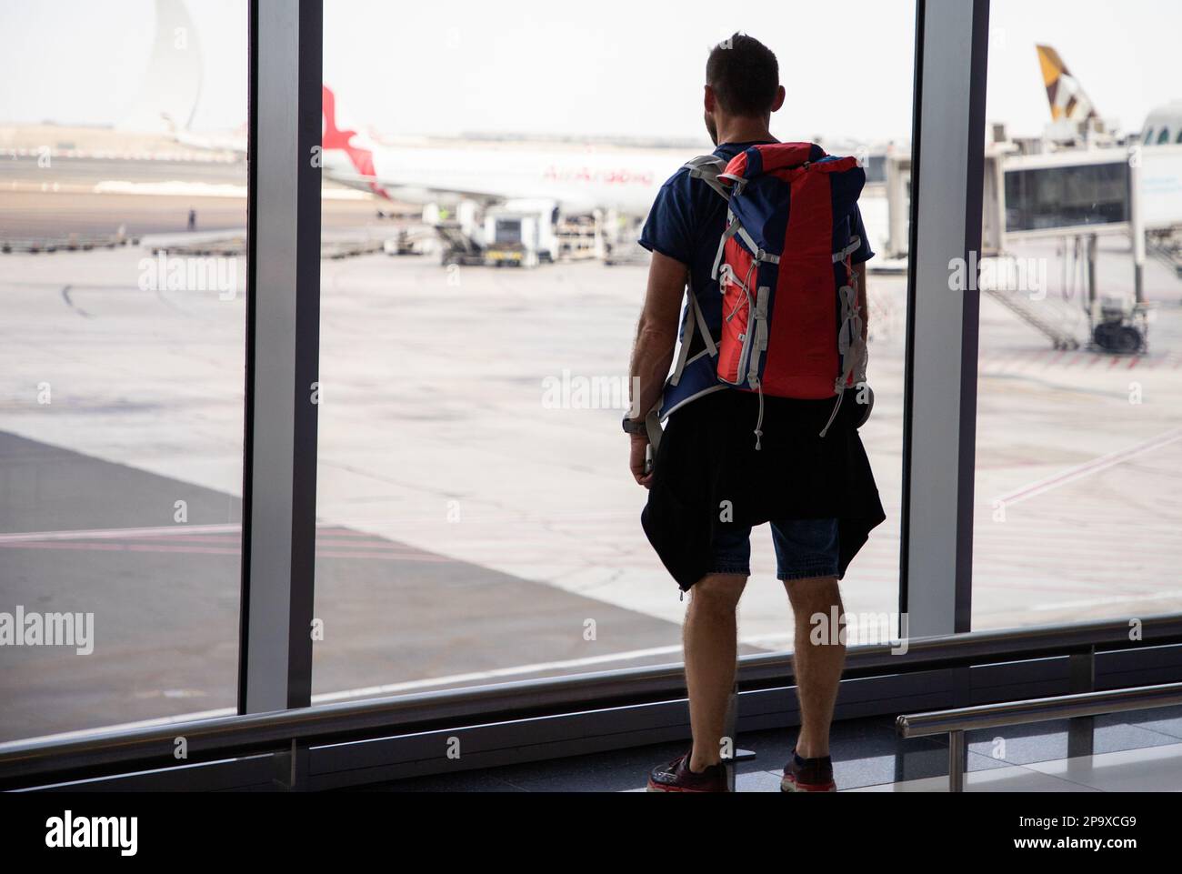 Cheerful man backpack suitcase hi-res stock photography and images - Alamy
