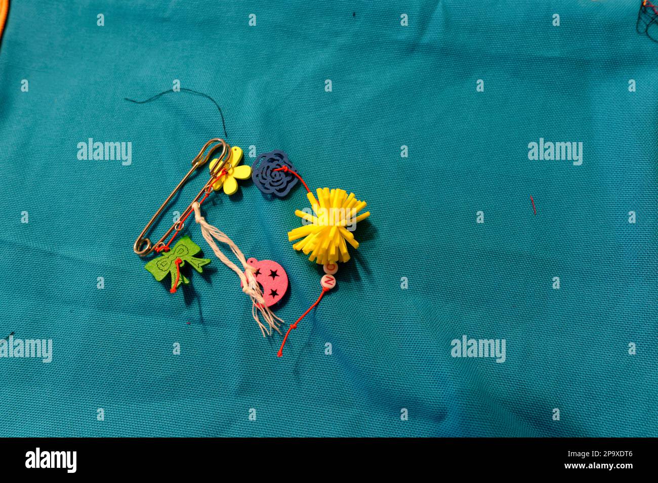 Handcraft accessories on a string ready to be added to design Stock ...