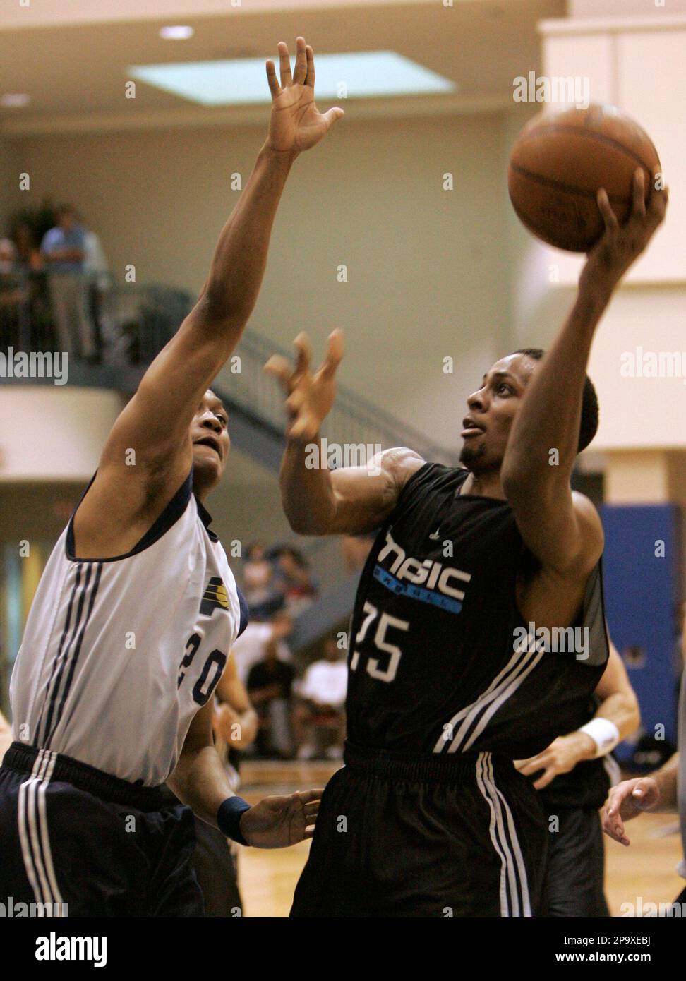 Orlando Magic guard Cliff Hammonds goes up for a shot next to Indiana ...