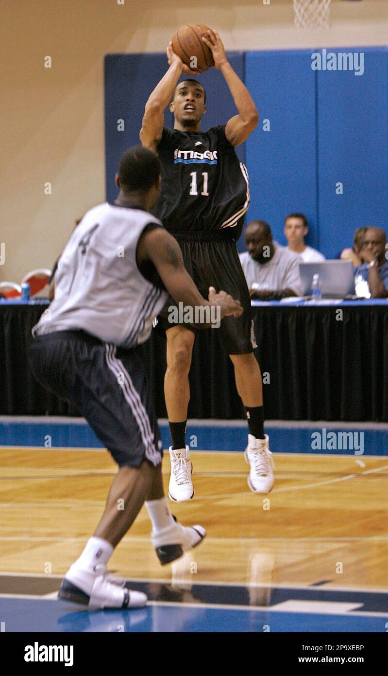 Orlando Magic guard Courtney Lee takes a shot over Indiana Pacers ...