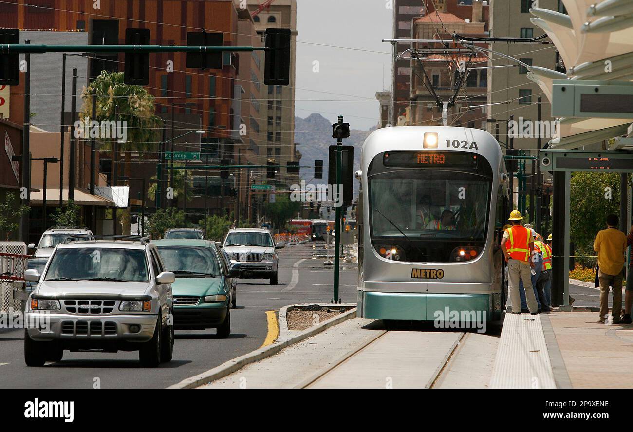 A Metro light rail train pulls into downtown Phoenix for the first time ...
