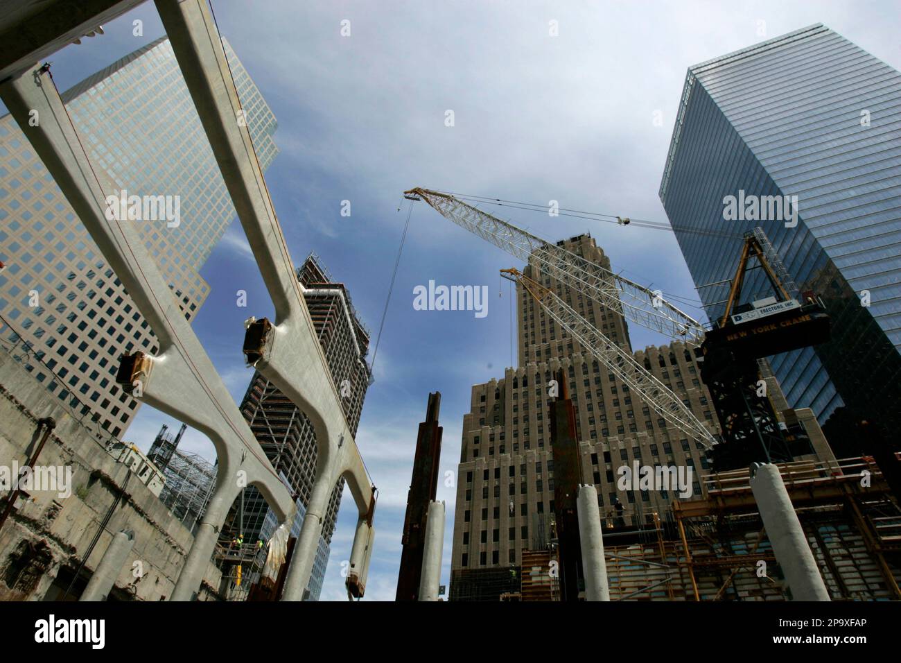 The first two of 47 epoxy coated steel beams, left, that are a part of ...
