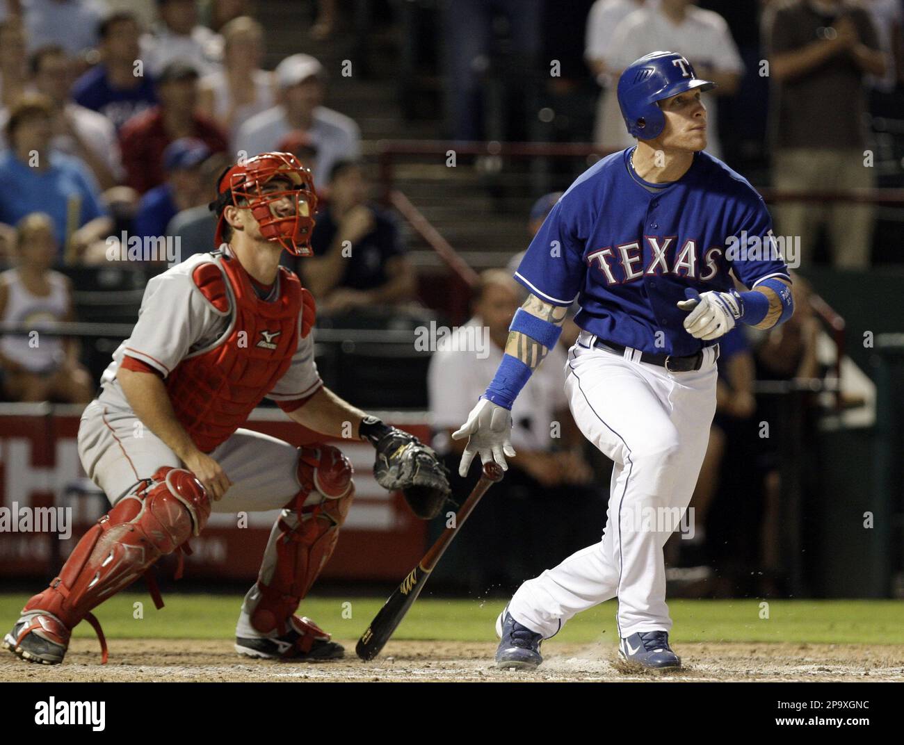 Texas Rangers' Josh Hamilton, right, and Los Angeles Angels catcher ...